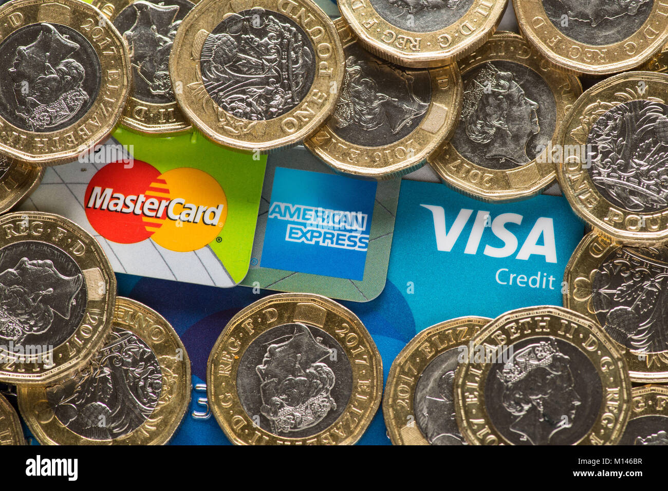 Mastercard, American Express and Visa credit cards with UK one pound ...