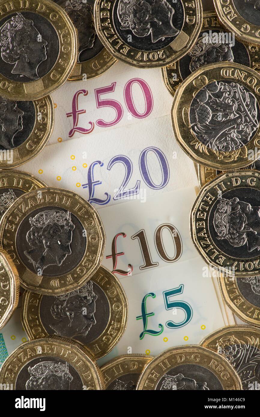 UK five pound, ten pound, twenty pound and fifty pound notes with one ...