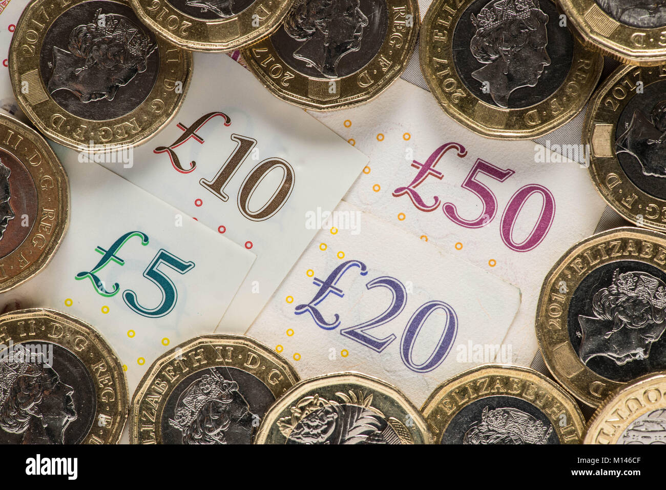 UK five pound, ten pound, twenty pound and fifty pound notes with one ...