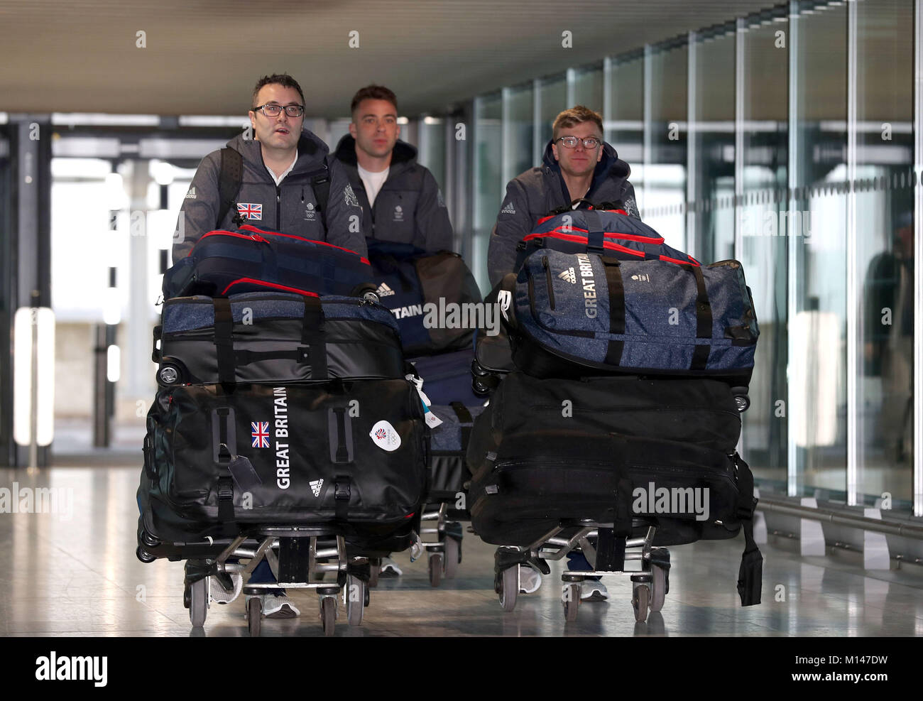 Joshua Cheetham (right) arrives at Heathrow Airport, London, for the ...