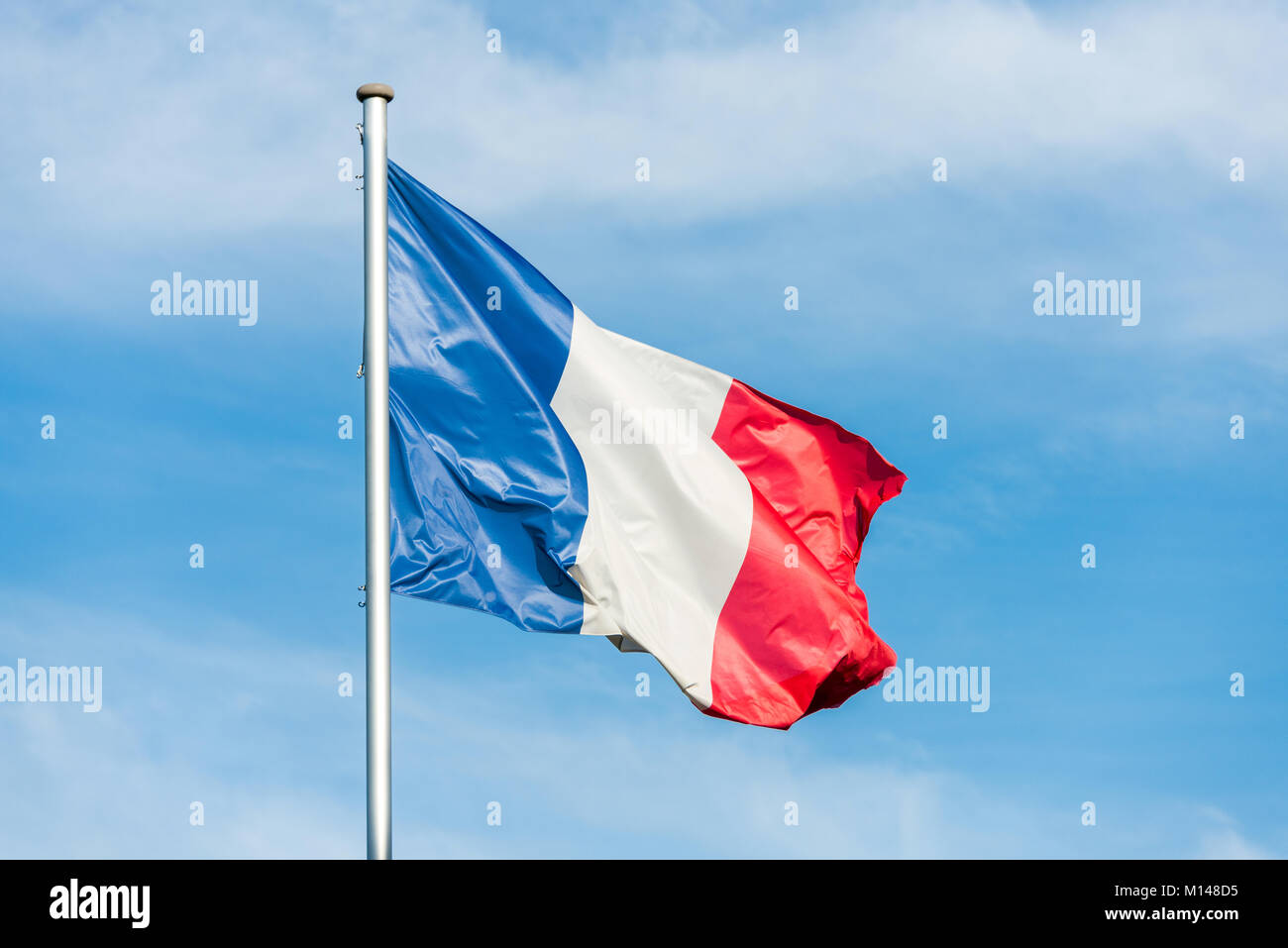French flag flying in front hi-res stock photography and images - Alamy