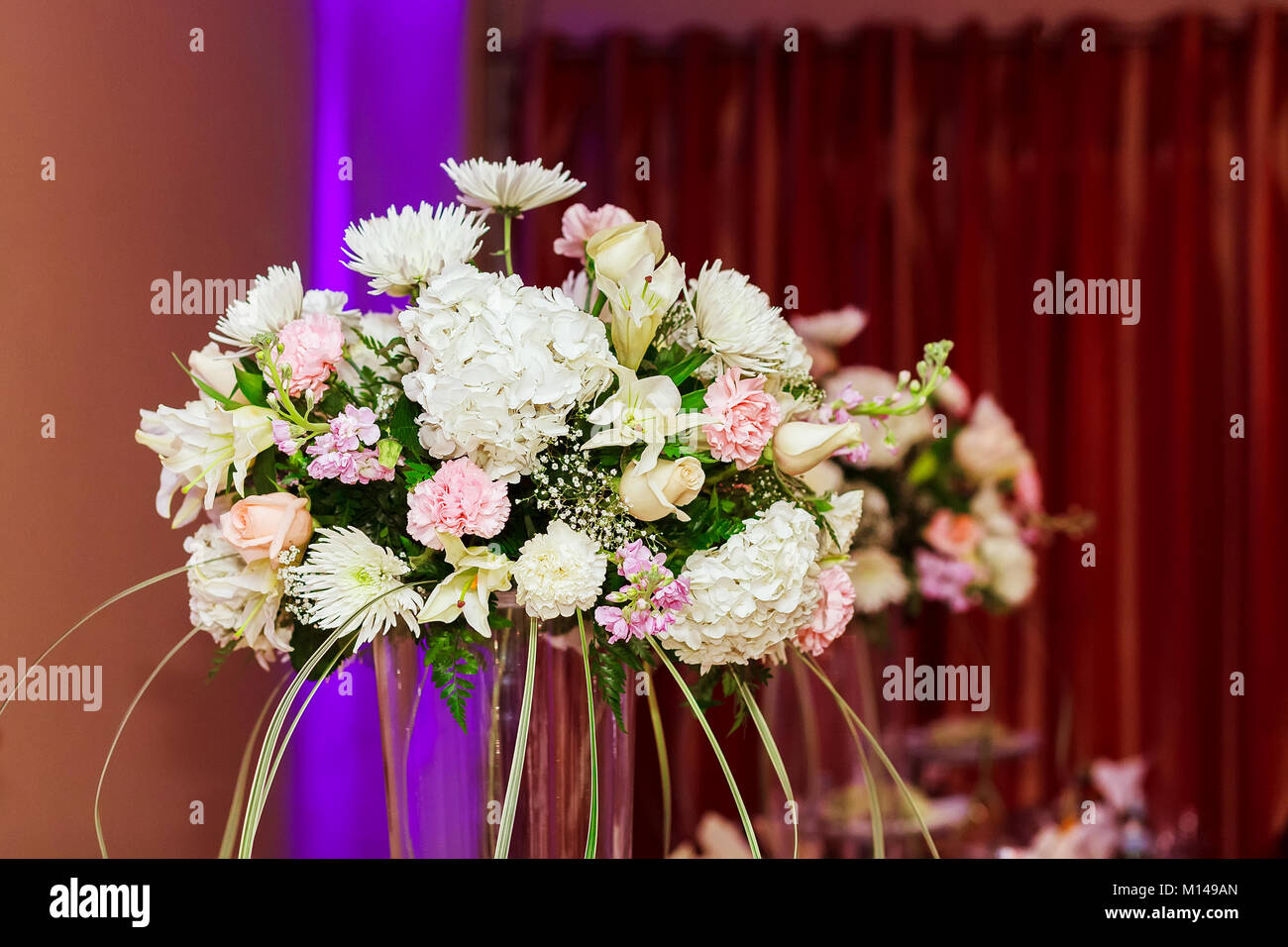 Bouquet of flowers in pots in a restaurant Flowers bouquet close up ...