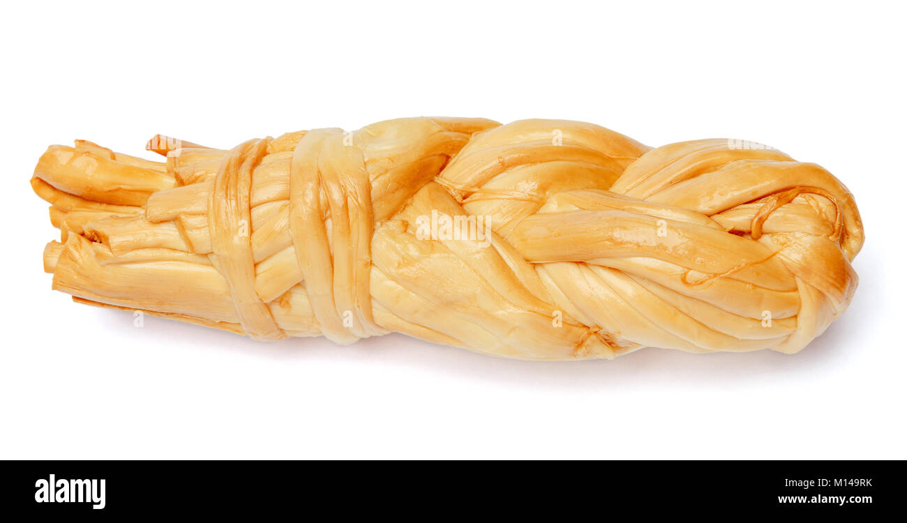 Smoked braided cheese isolated on white background Stock Photo - Alamy