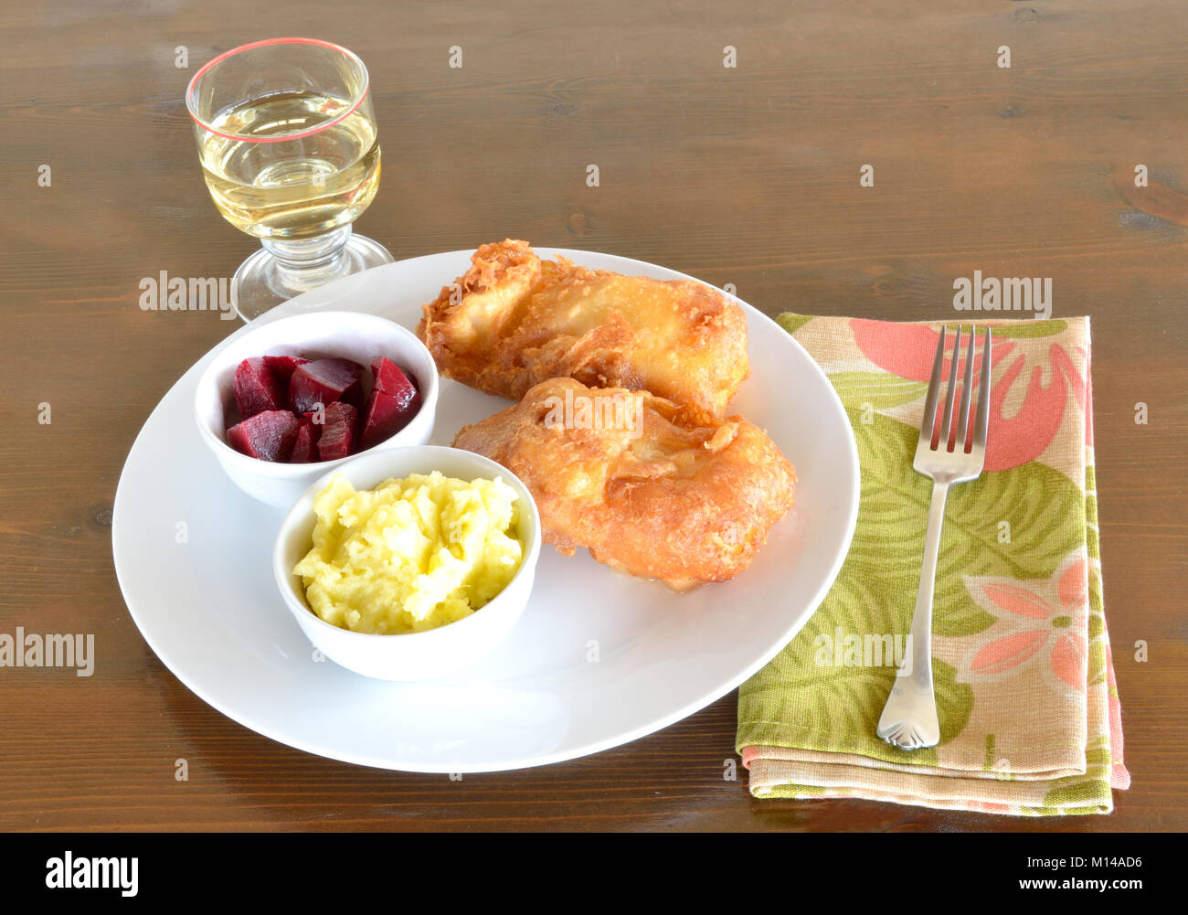 Traditional Greek dish of fried cod fish fillet, garlic dip, known as ...