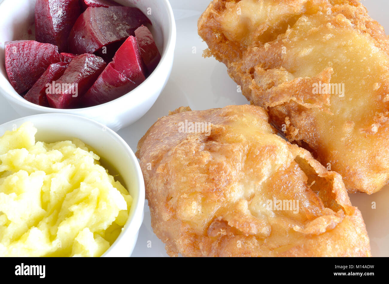 Traditional Greek dish of fried cod fish fillet, garlic dip, known as ...