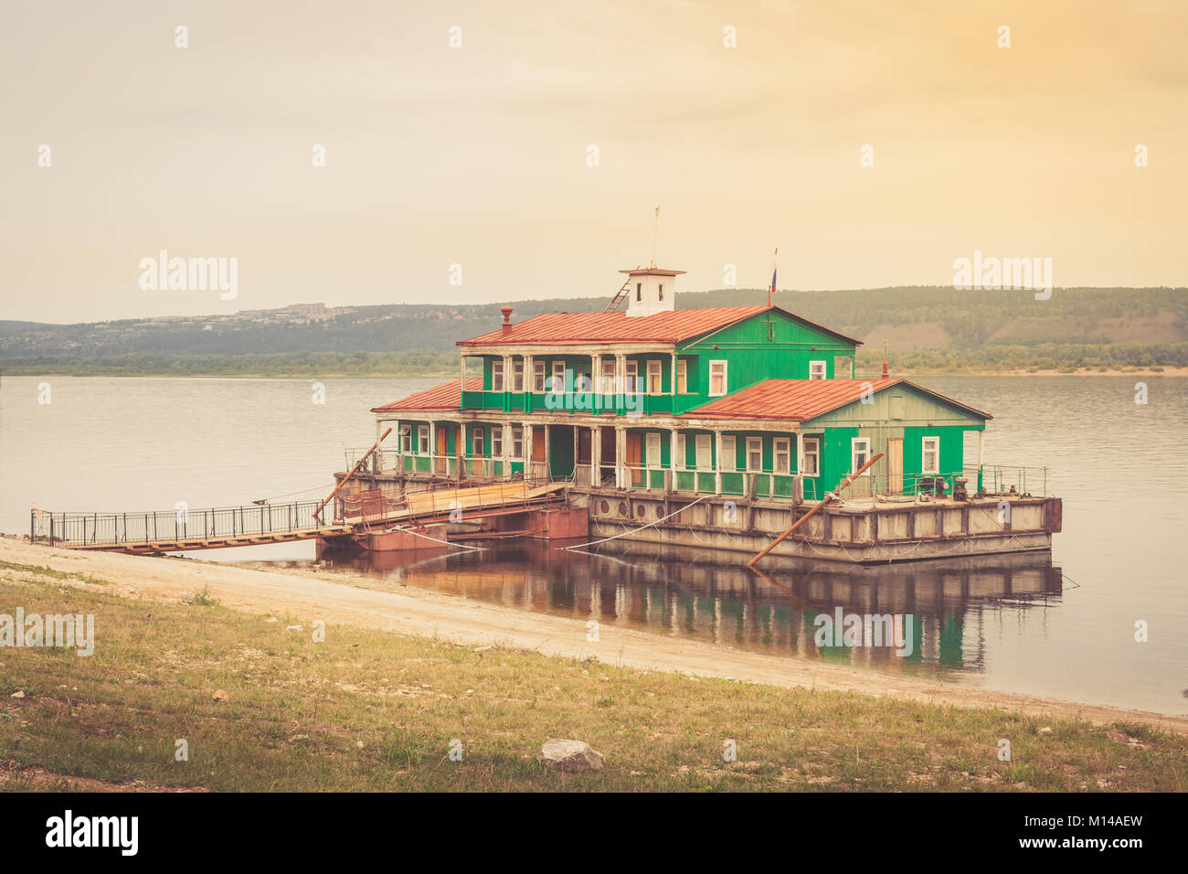 Small wooden mobile floating pier on the Volga river. Toned imag Stock ...