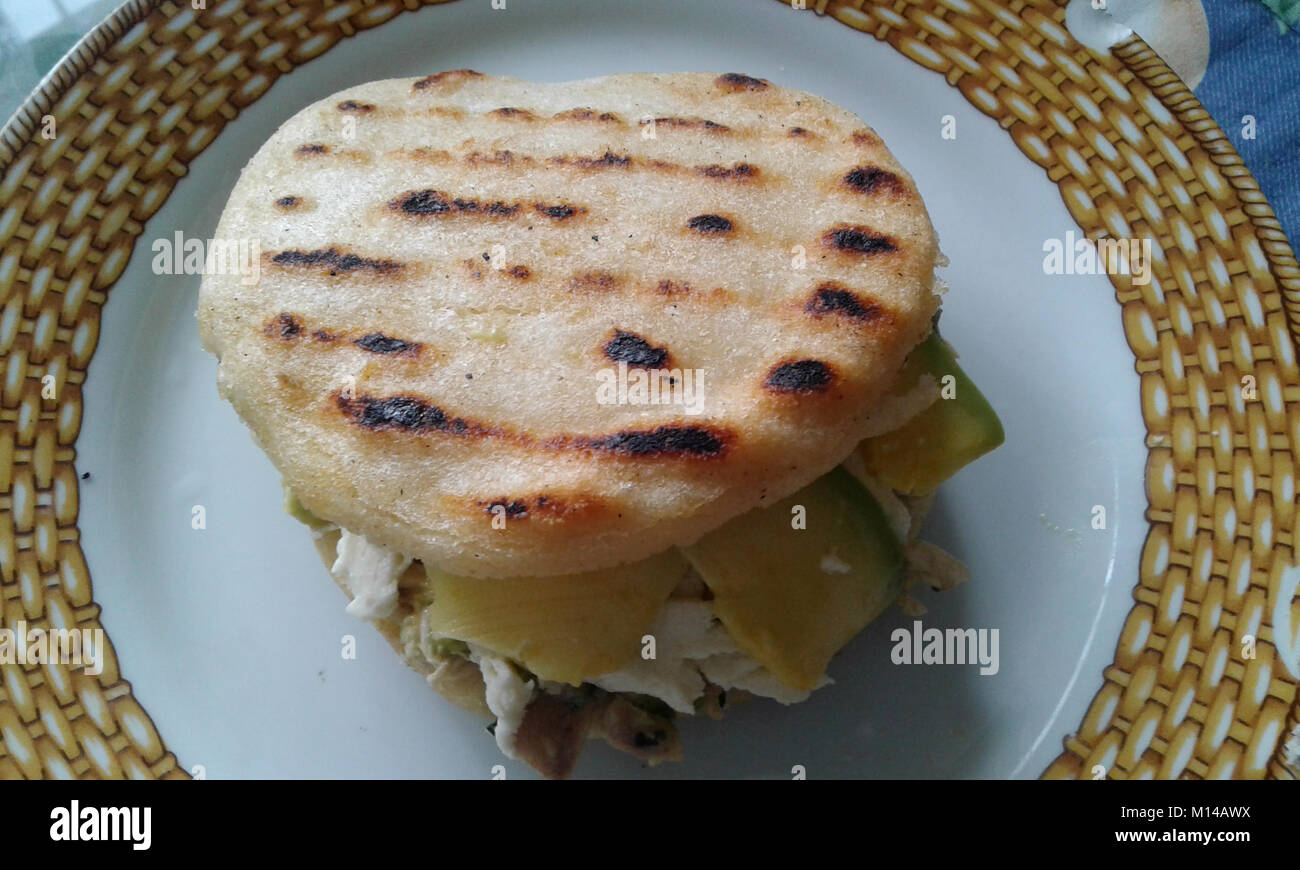 Eating arepas hi-res stock photography and images - Alamy