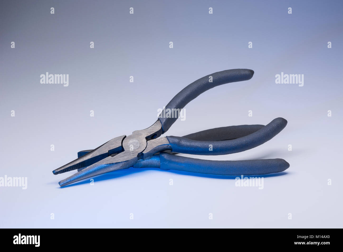 Set of small pincers and pliers Stock Photo - Alamy
