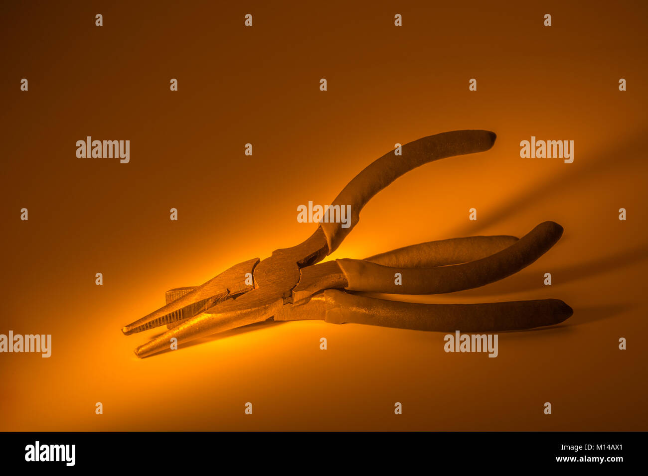 Set of small pincers and pliers Stock Photo - Alamy