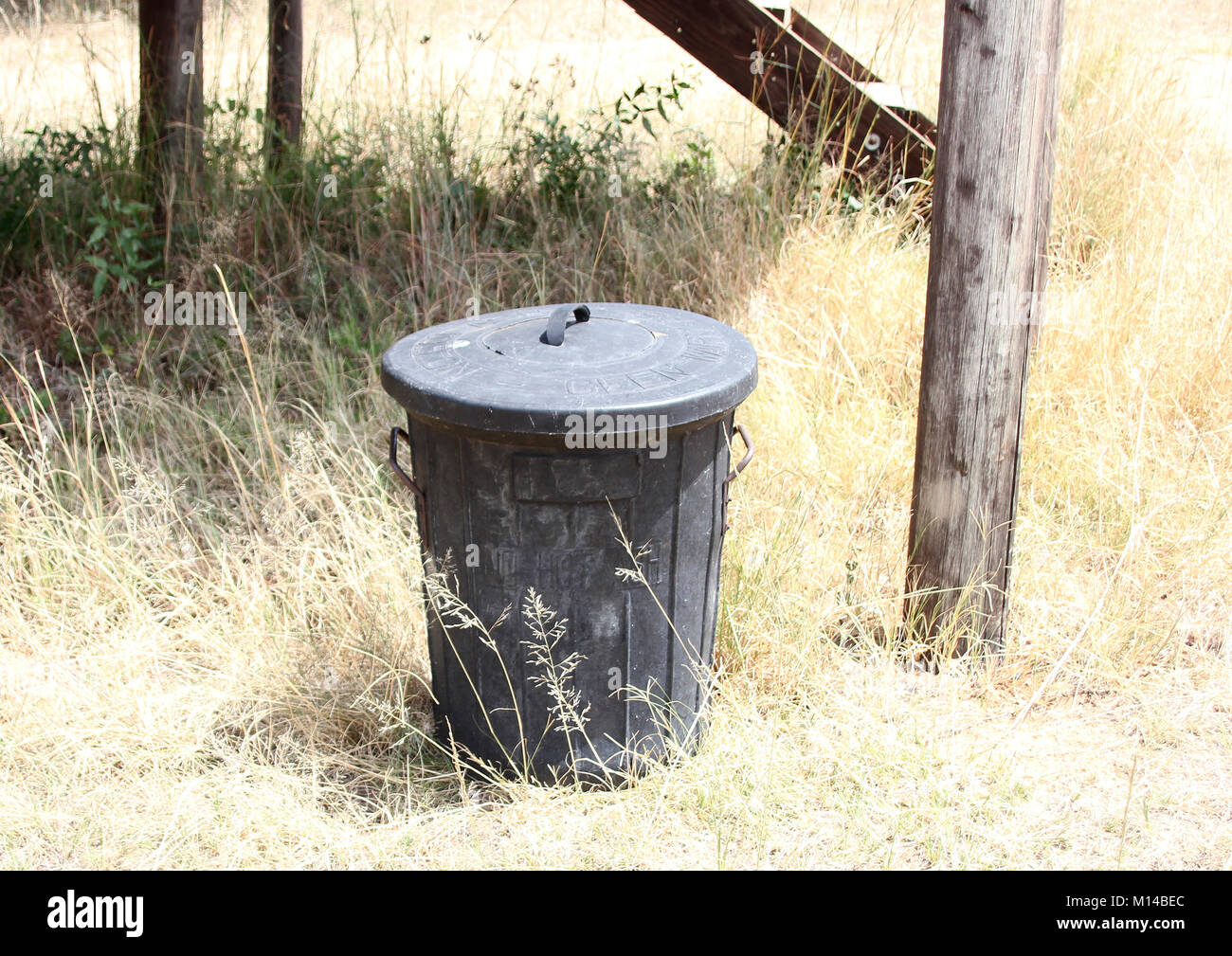 A rubbish bin at the base of a watchtower in savannah at Zebula Game ...