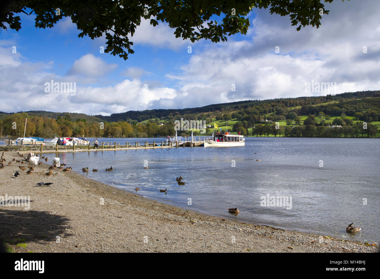Coniston, UK - 14th September 2011: A sightseeing cruise boat waits in ...