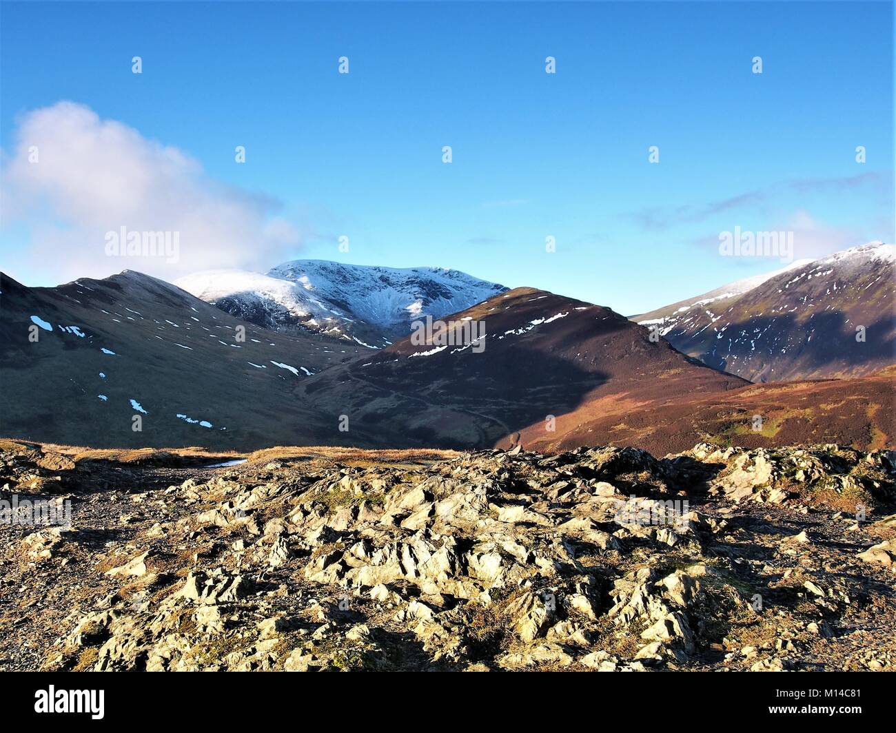 Snow capped Lakeland Fells from Barrow summit, Lake District National ...