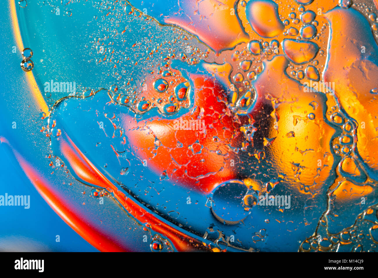 Abstract background of drops of the liquid in red and blue tones Stock ...