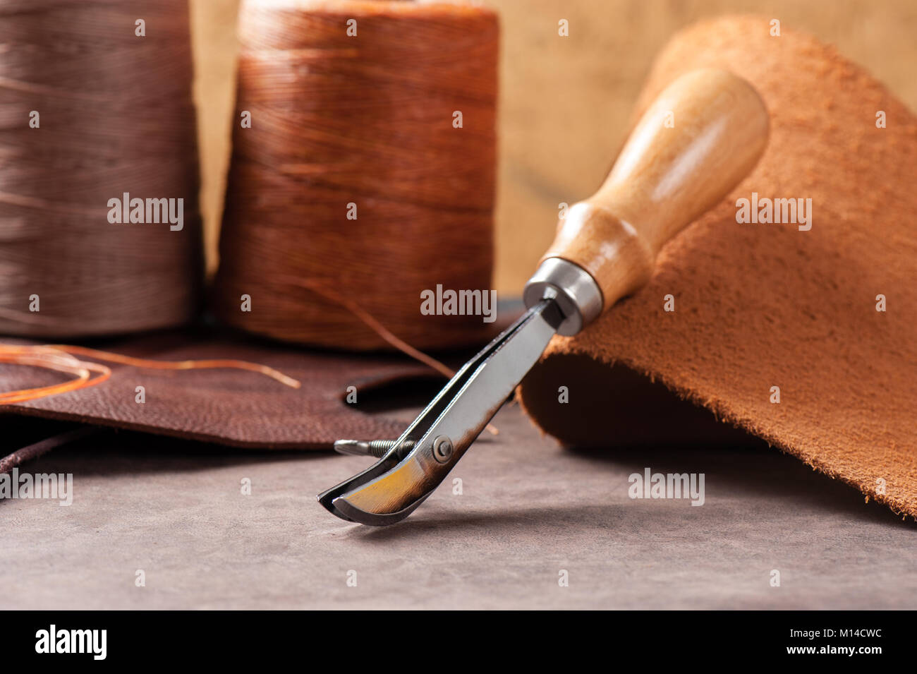 The adjustable double creaser for leather working Stock Photo - Alamy