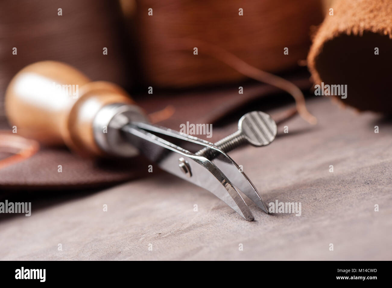 The adjustable double creaser for leather working Stock Photo - Alamy