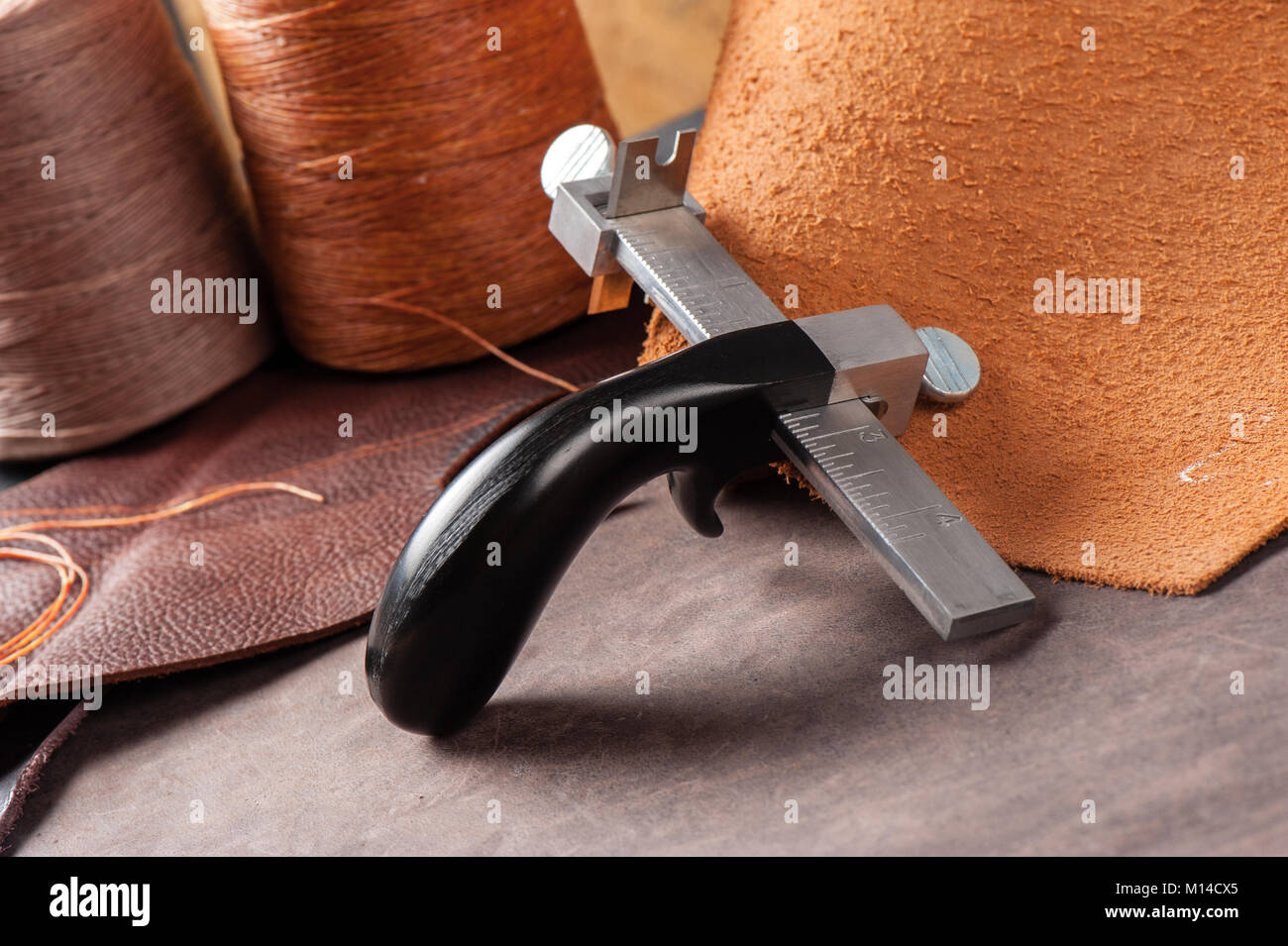 The strap cutter for leather working Stock Photo - Alamy