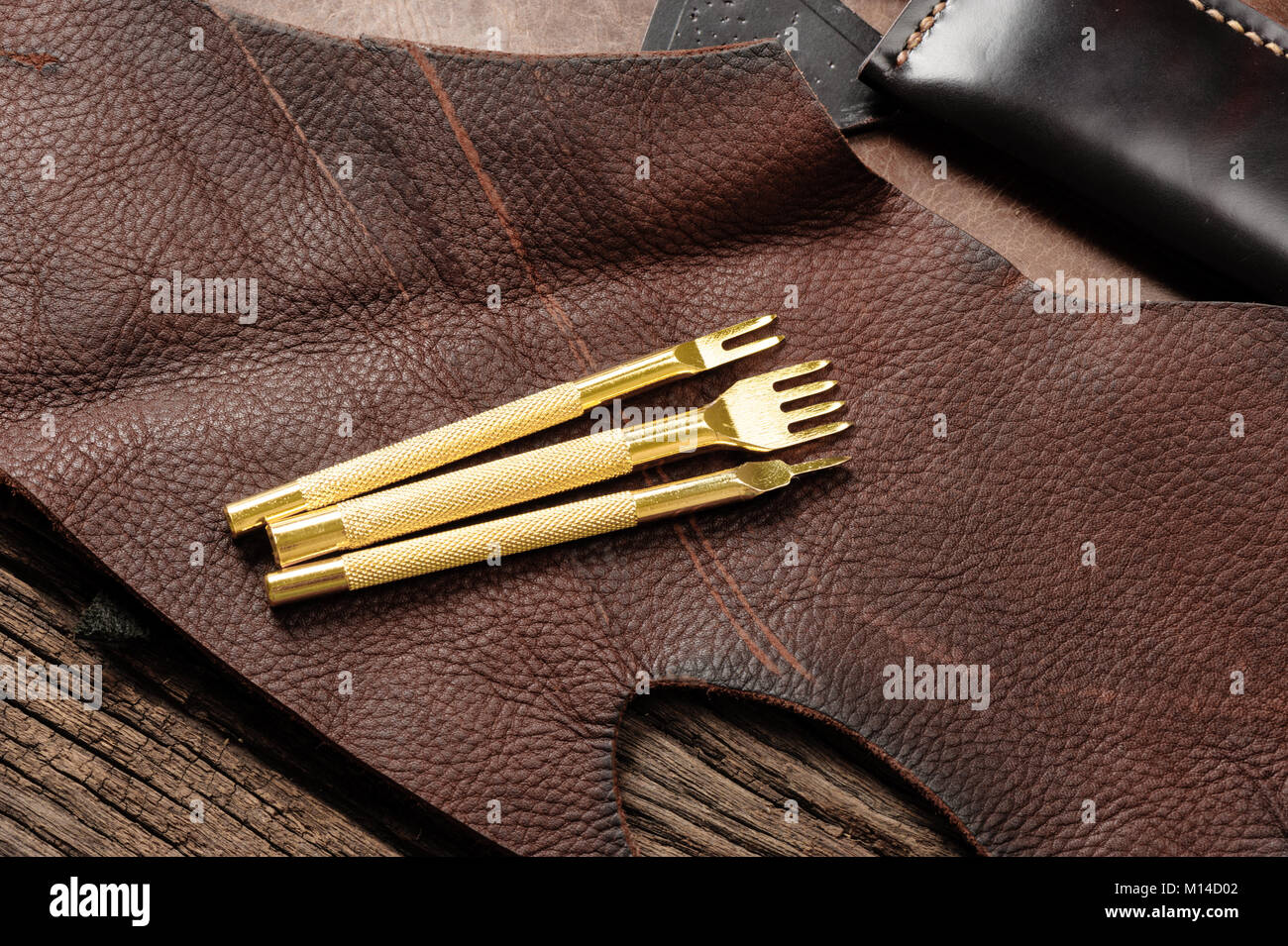 The pricking irons for hand stitching leather Stock Photo - Alamy