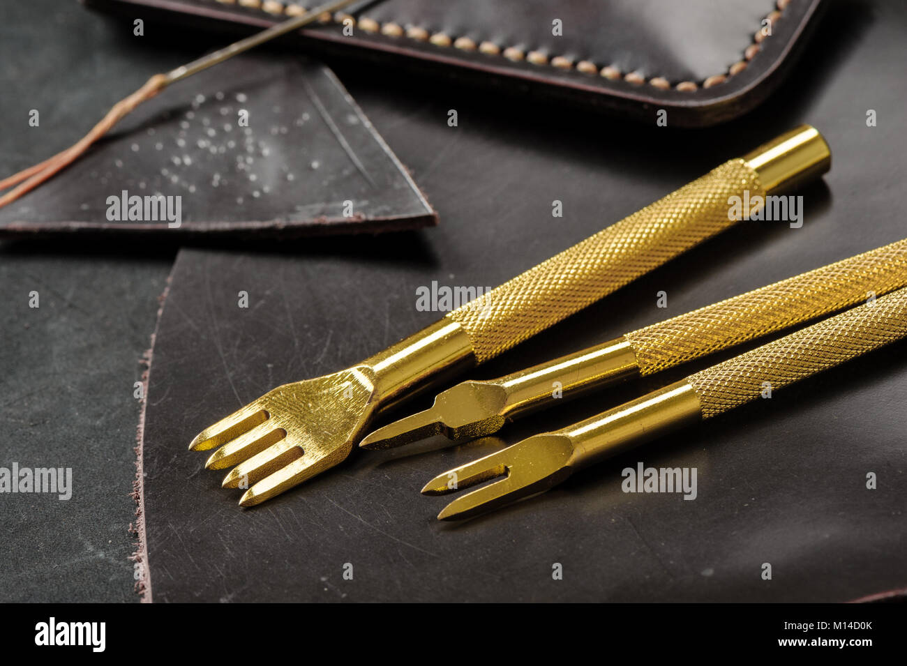 The pricking irons for hand stitching leather Stock Photo - Alamy