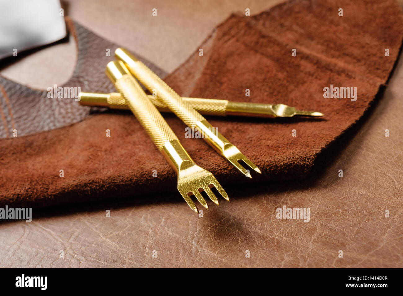 The pricking irons for hand stitching leather Stock Photo - Alamy