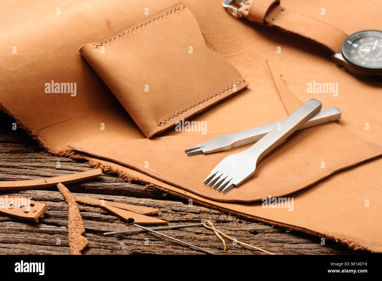 The pricking irons for hand stitching leather Stock Photo - Alamy