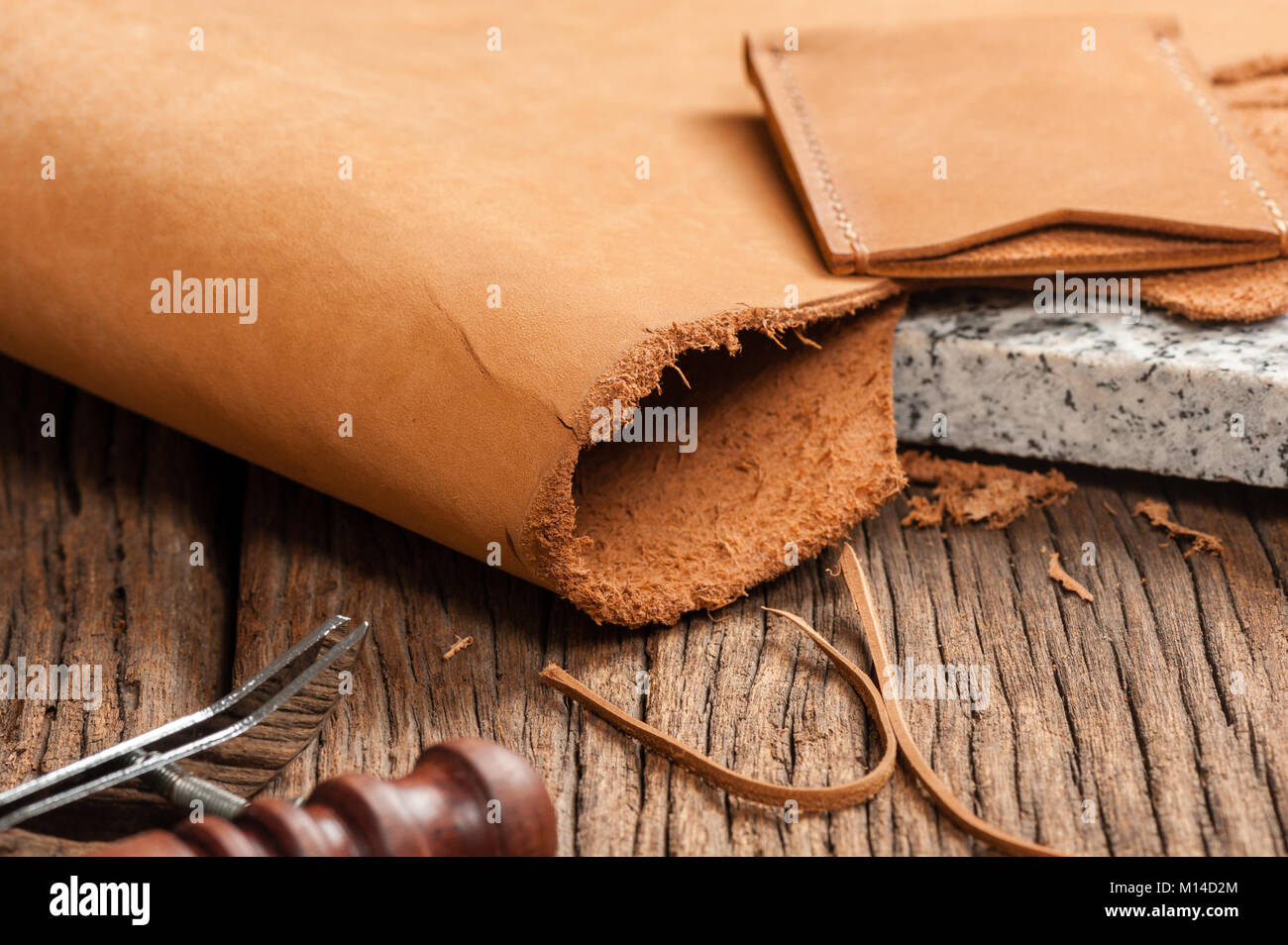 leather working, closeup details of brown nubuck leather Stock Photo ...