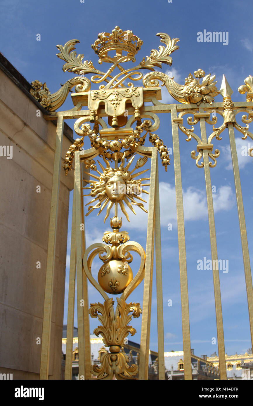 Golden bars on the front gate of Palace of Versailles, Ile-De-France ...