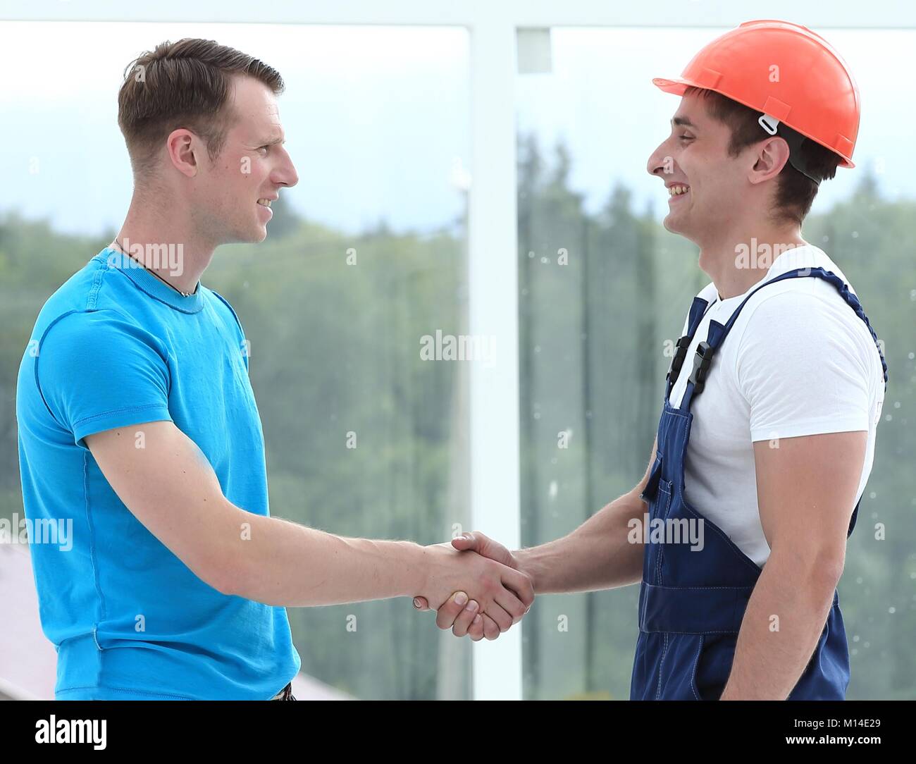 concept of cooperation. welcome and handshake Stock Photo - Alamy