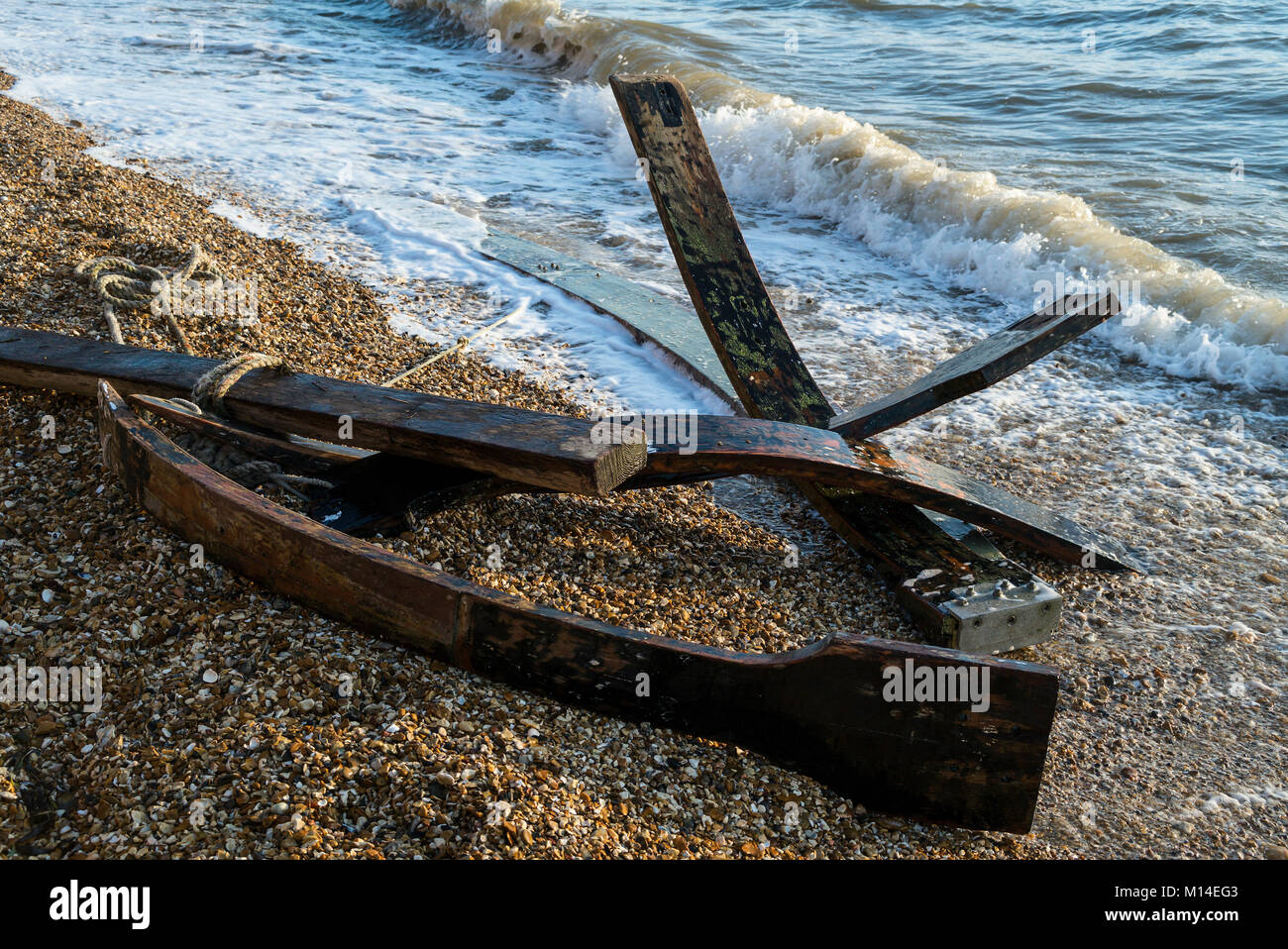 Storm debris washed up on the shingle beach at Meon Shore on the Solent ...