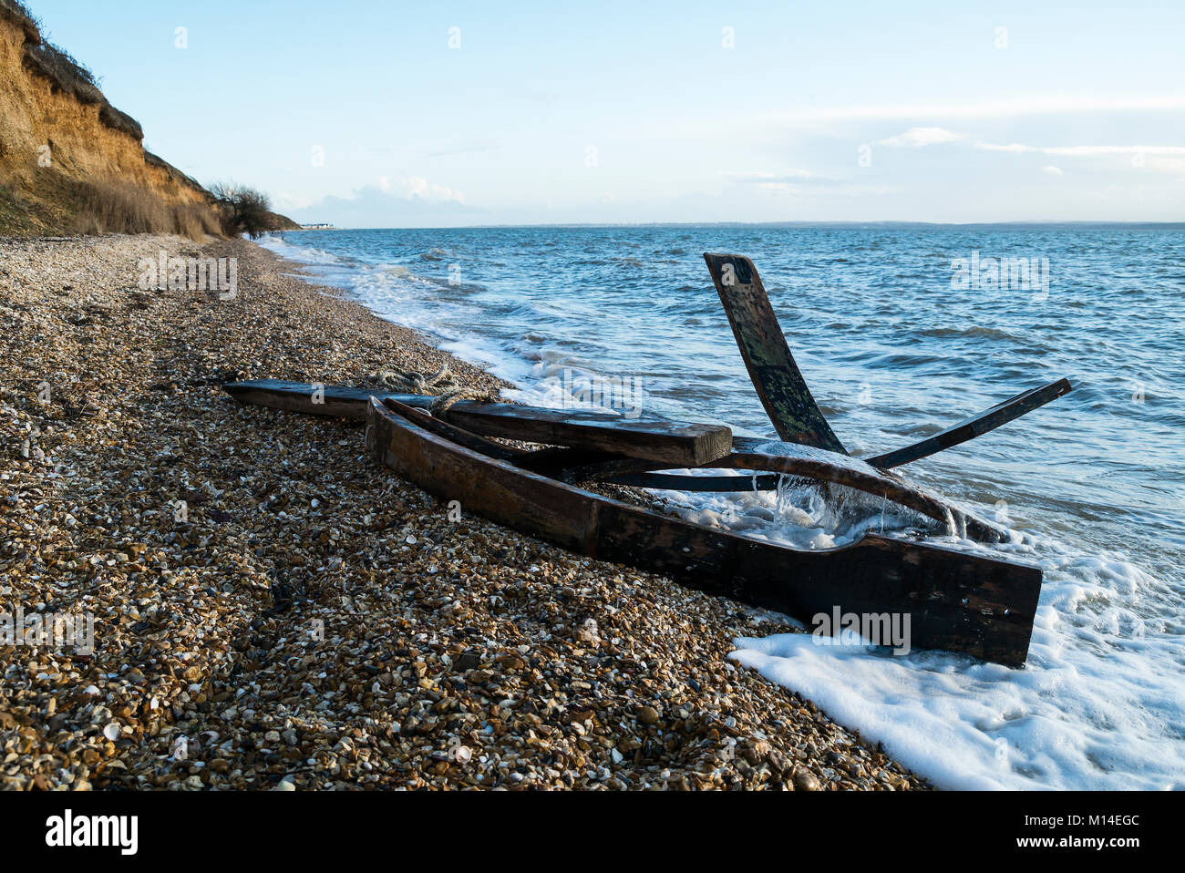 Storm debris washed up on the shingle beach at Meon Shore on the Solent ...