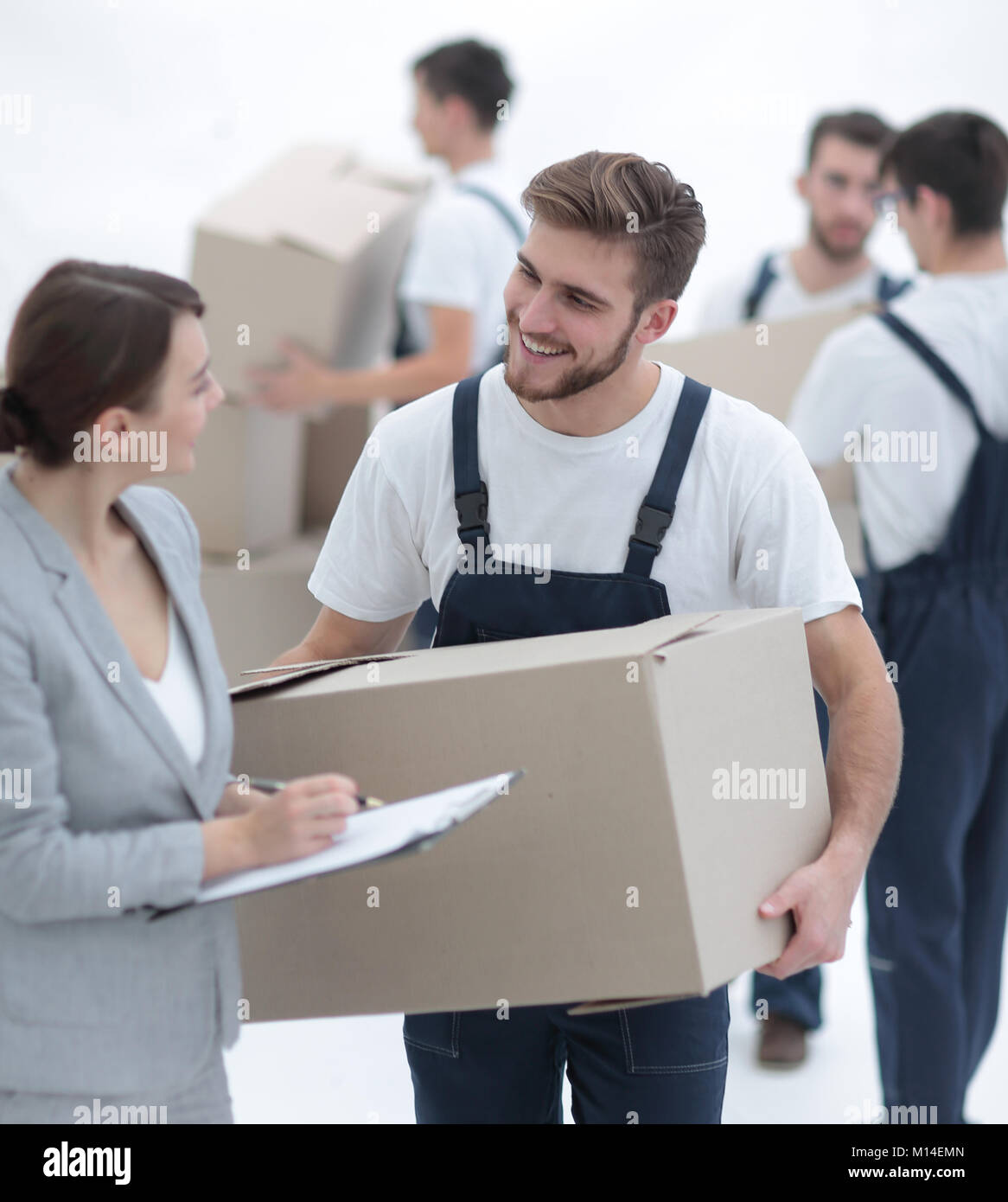 Businessman with documents, creating a stack of cardboard boxes Stock ...