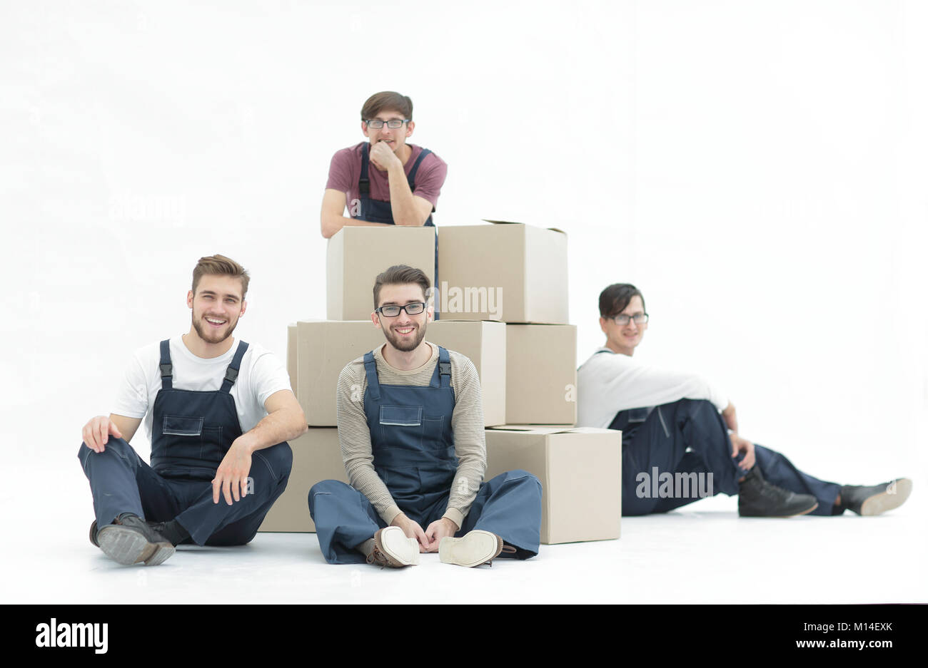 Men with stacked boxes isolated on white Stock Photo - Alamy