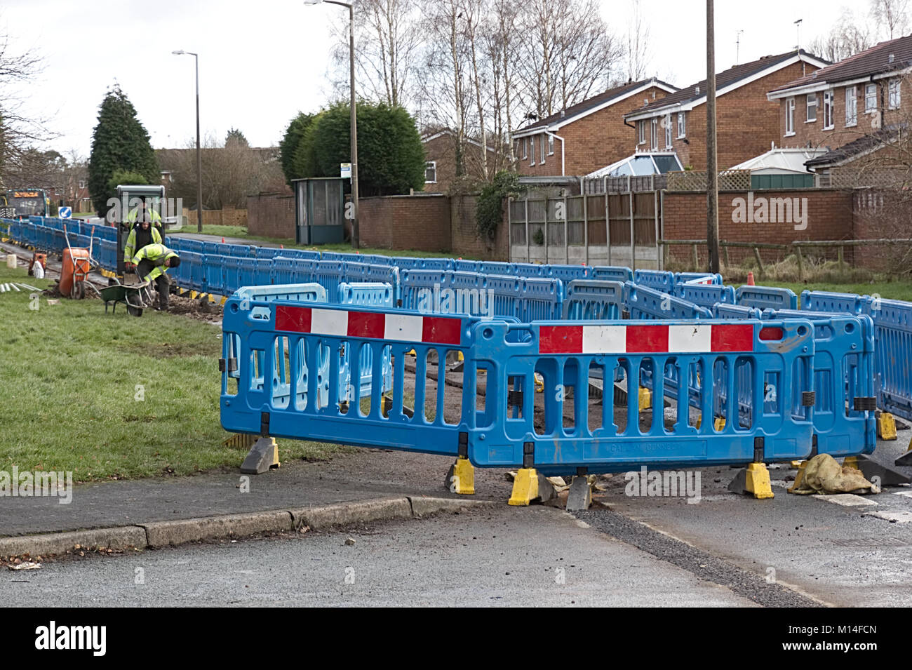 Road works to lay optical fibre cabling Stock Photo - Alamy