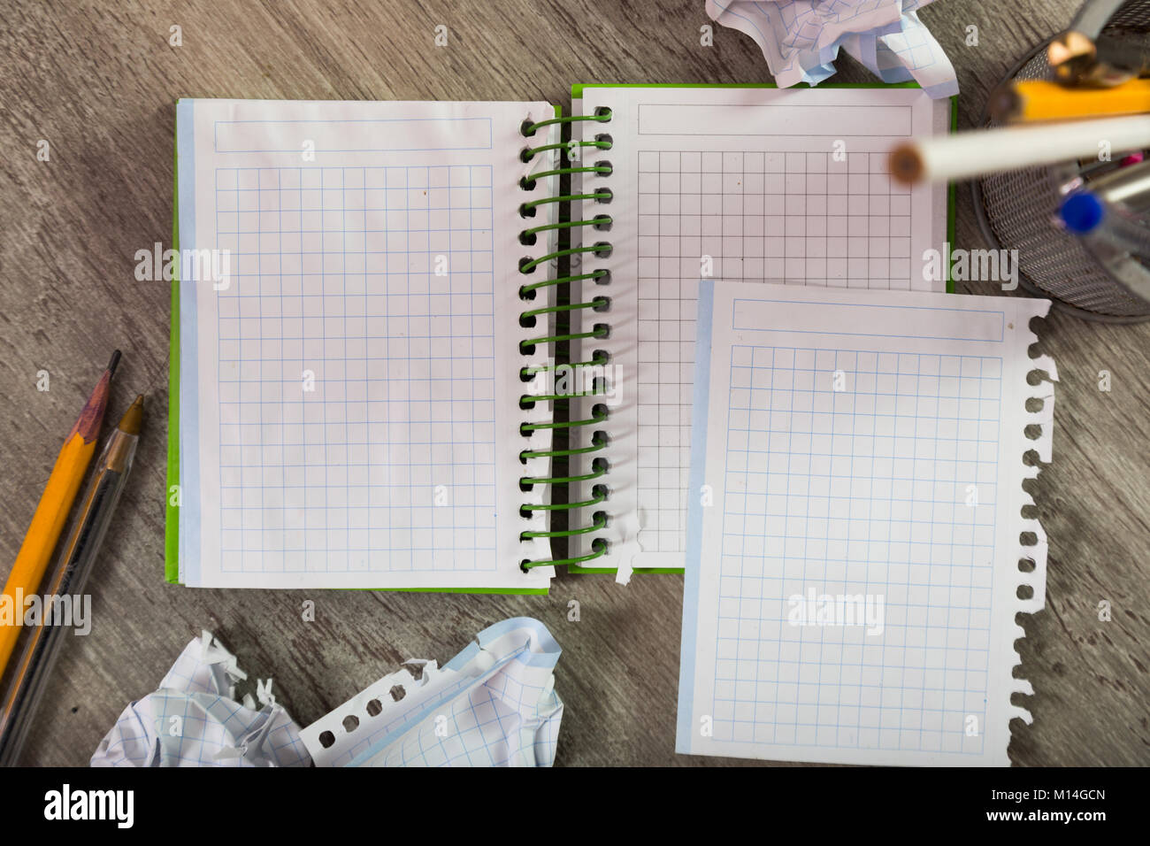 Notebook pages with writing materials Stock Photo - Alamy