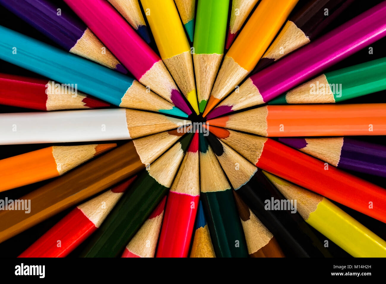 Colored Pencils in a symmetrical Pattern Stock Photo - Alamy
