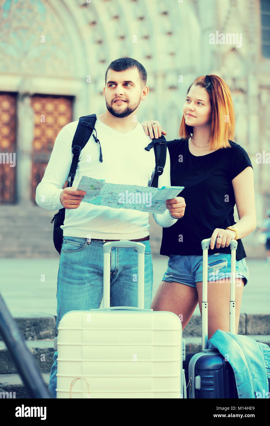Positive family walking map hi-res stock photography and images - Alamy