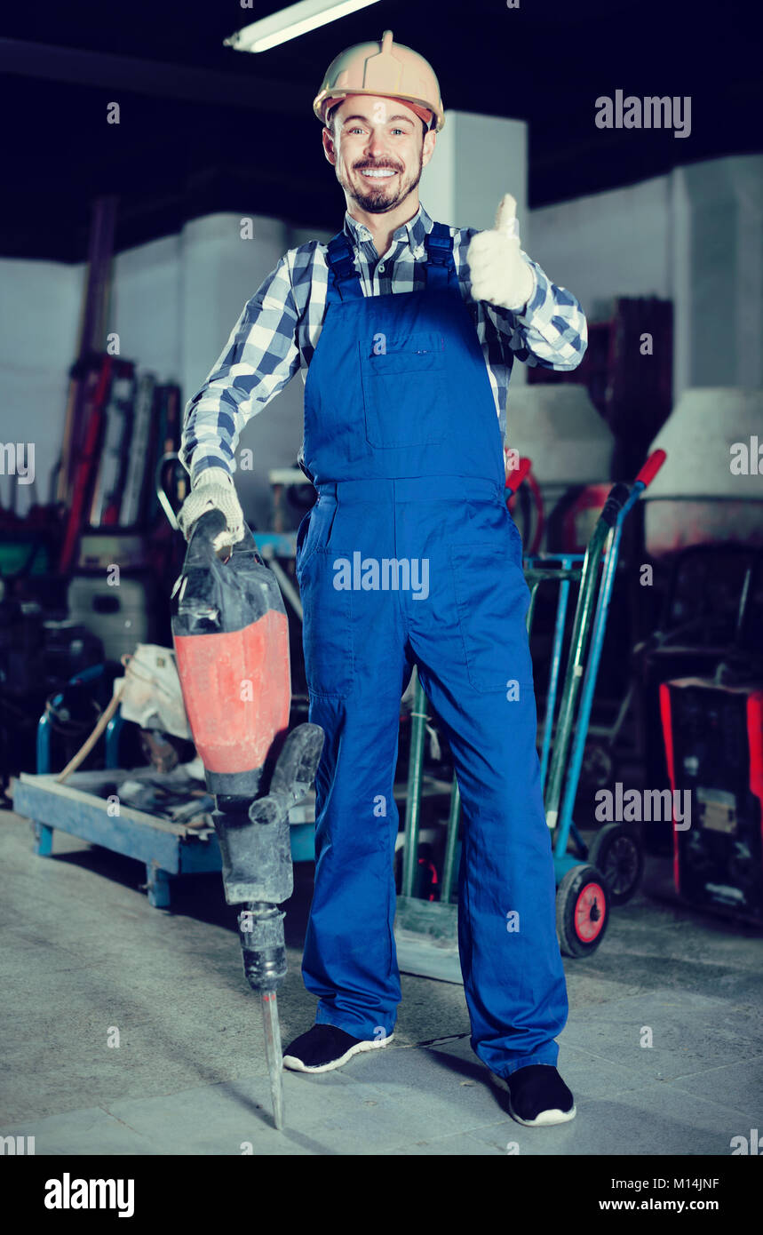 Man using jackhammer hi-res stock photography and images - Alamy