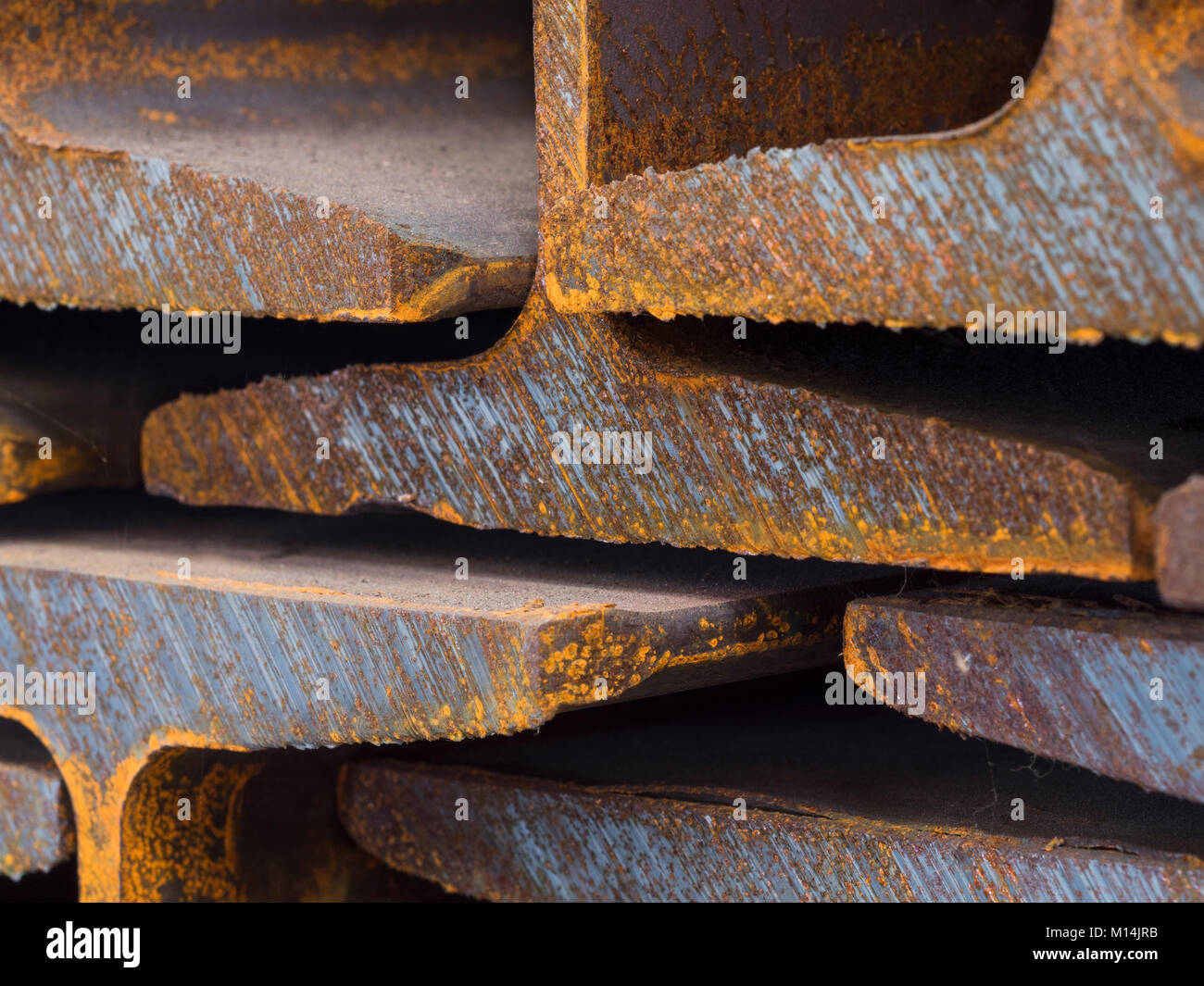 Detail of dusty, rusty I-beams at a warehouse. Shallow depth of field ...