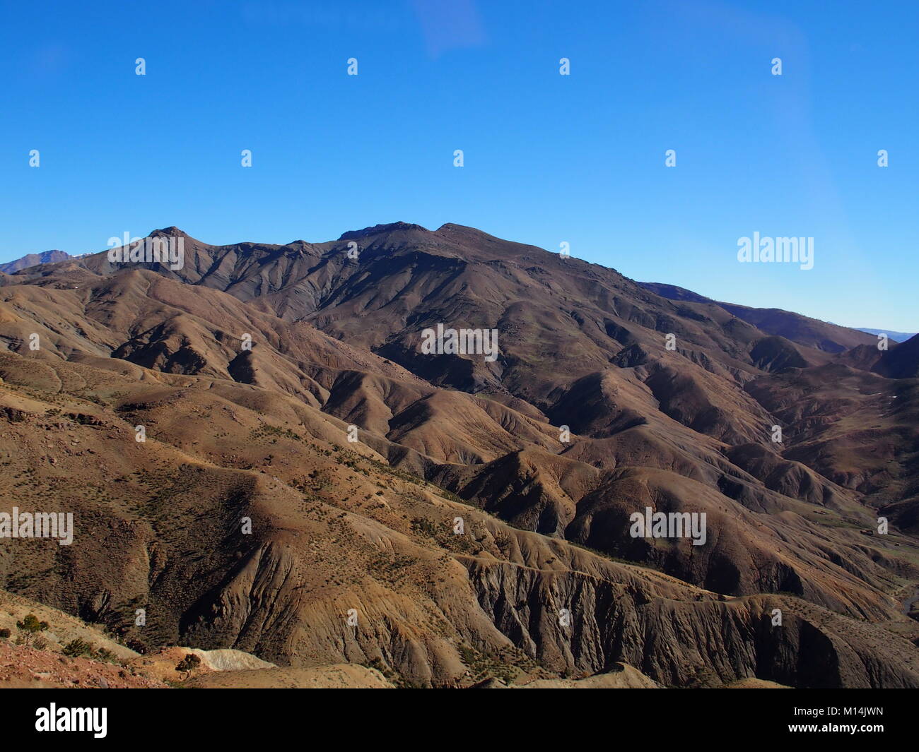 High ATLAS MOUNTAINS range landscape in MOROCCO seen from location near ...
