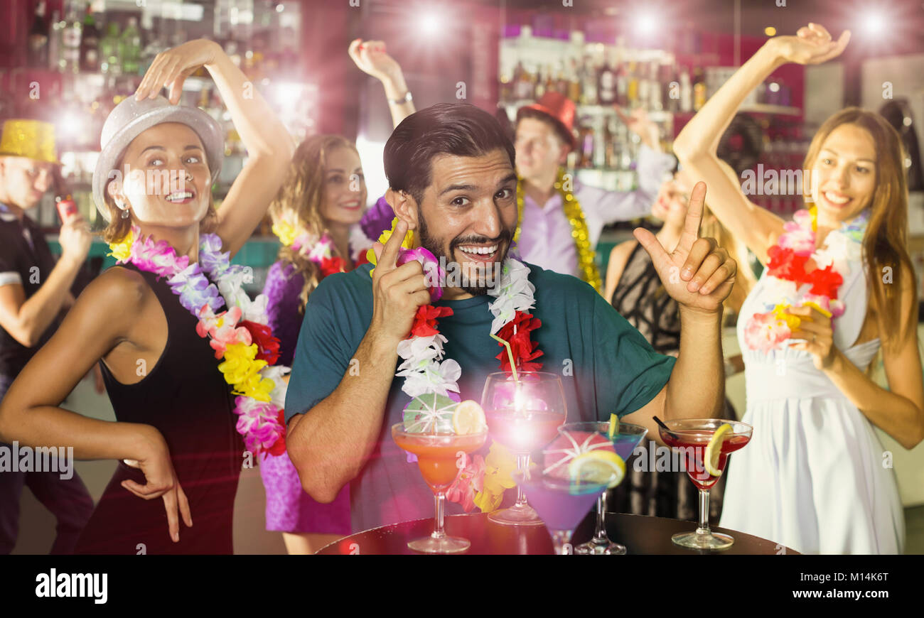Happy male 31-35 years old is having fun on hawaiian party Stock Photo ...