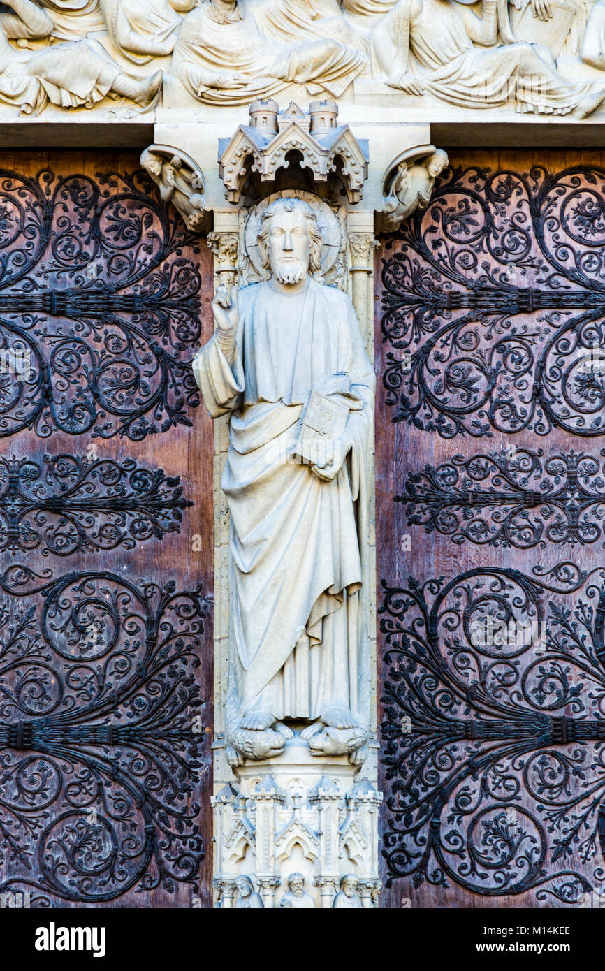 Paris, France: Priest statue on the column between the main dors on the ...