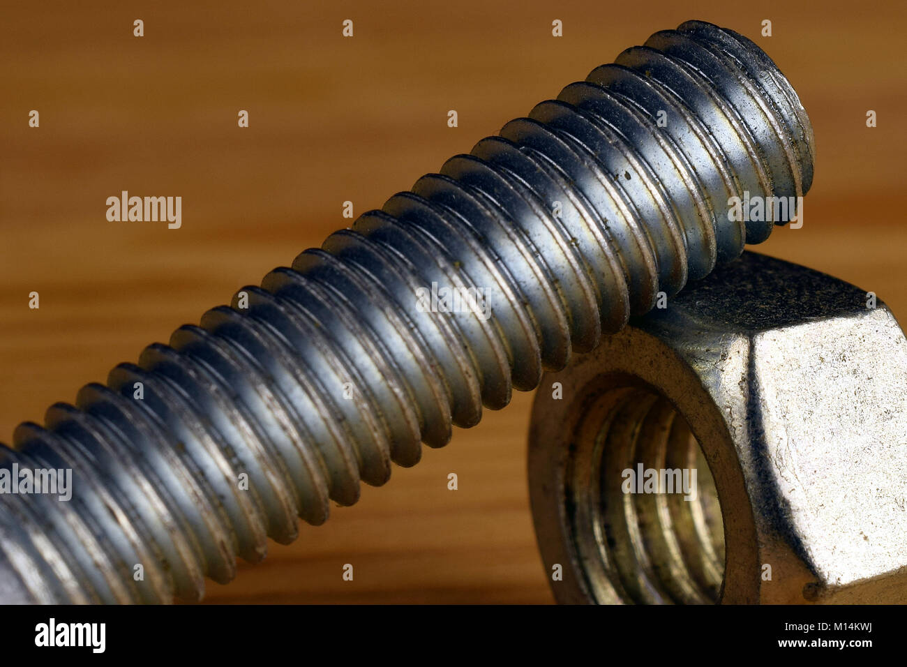 Bolt and nut close up image with space for text Stock Photo - Alamy