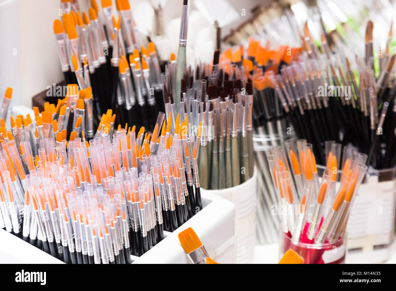 assortment of different new painting brushes in shop for artists Stock ...