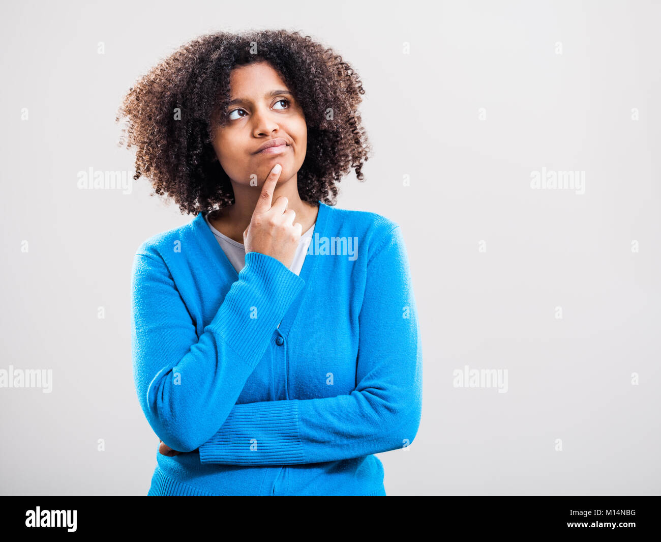 Portrait of pensive woman Stock Photo - Alamy