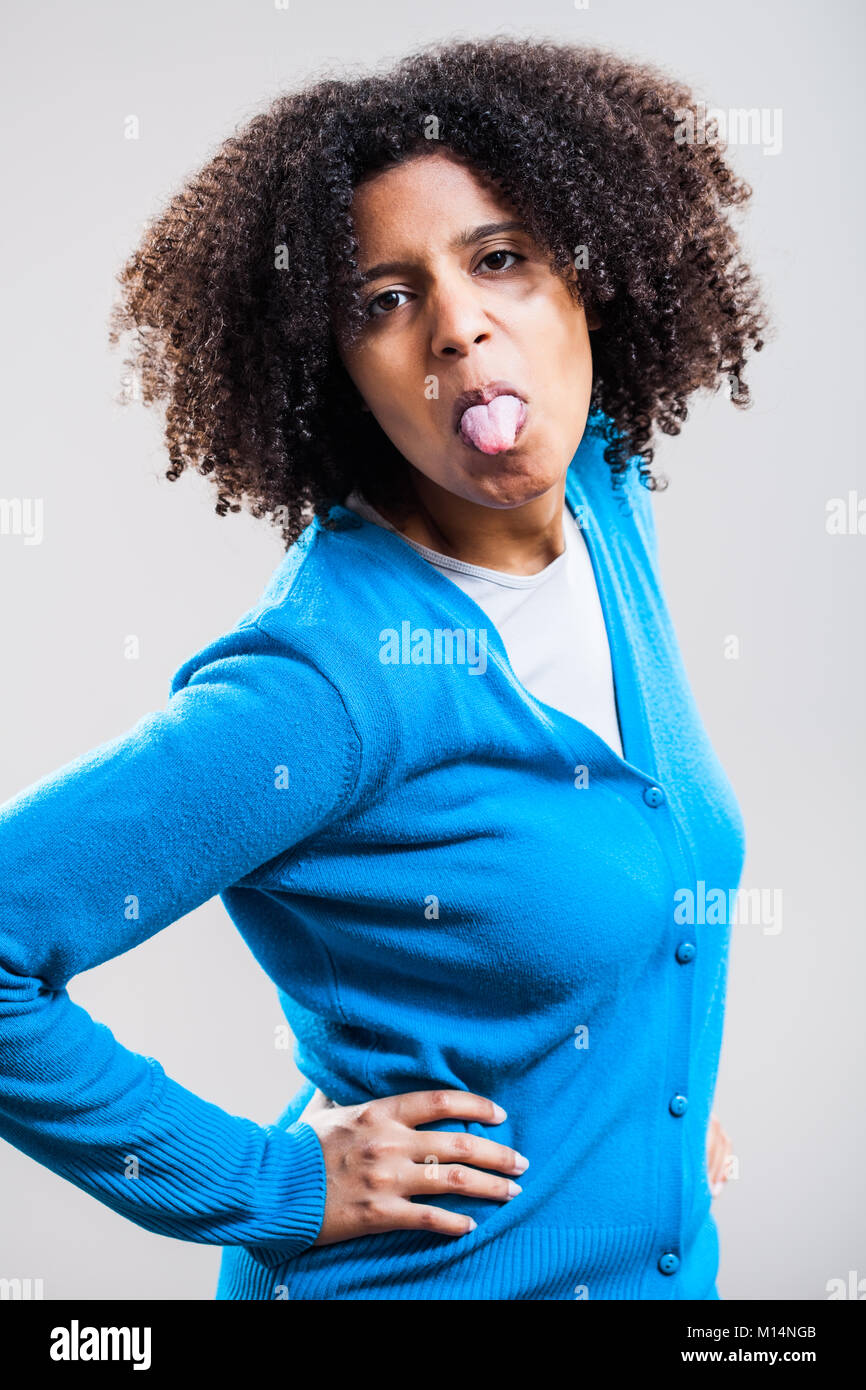 Portrait of woman making face Stock Photo - Alamy