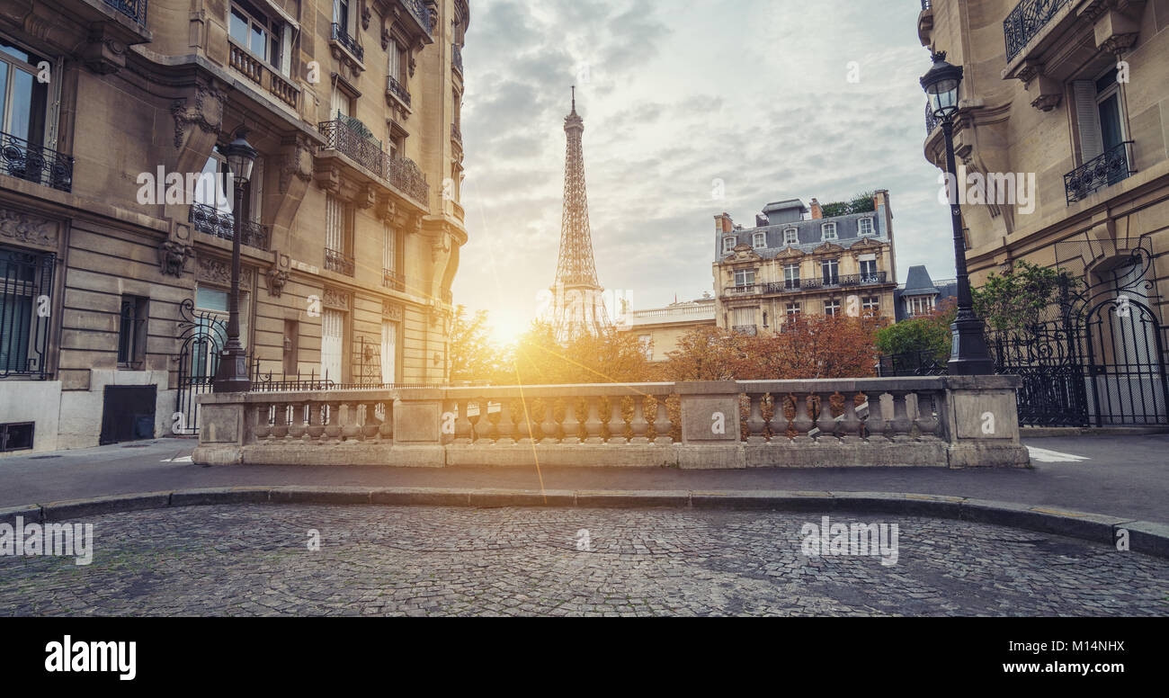 A small street in paris with view to the eiffel tower at sunset Stock ...
