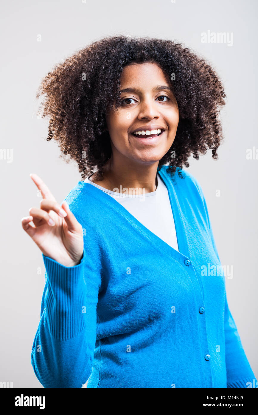 Happy woman having an idea Stock Photo - Alamy
