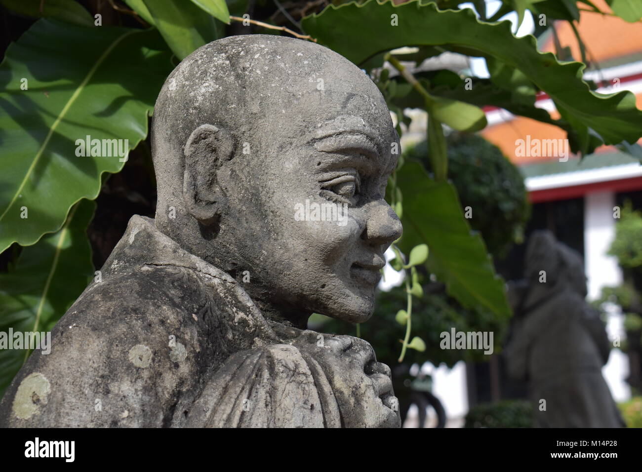 Statue of a monk Stock Photo - Alamy