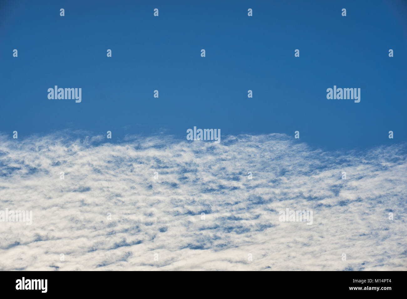 Photograph showing a transition between the clouds and a blue sky Stock ...