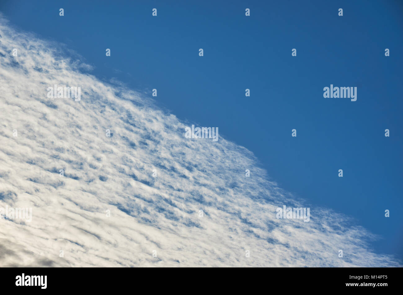 Photograph showing a transition between the clouds and a blue sky Stock ...