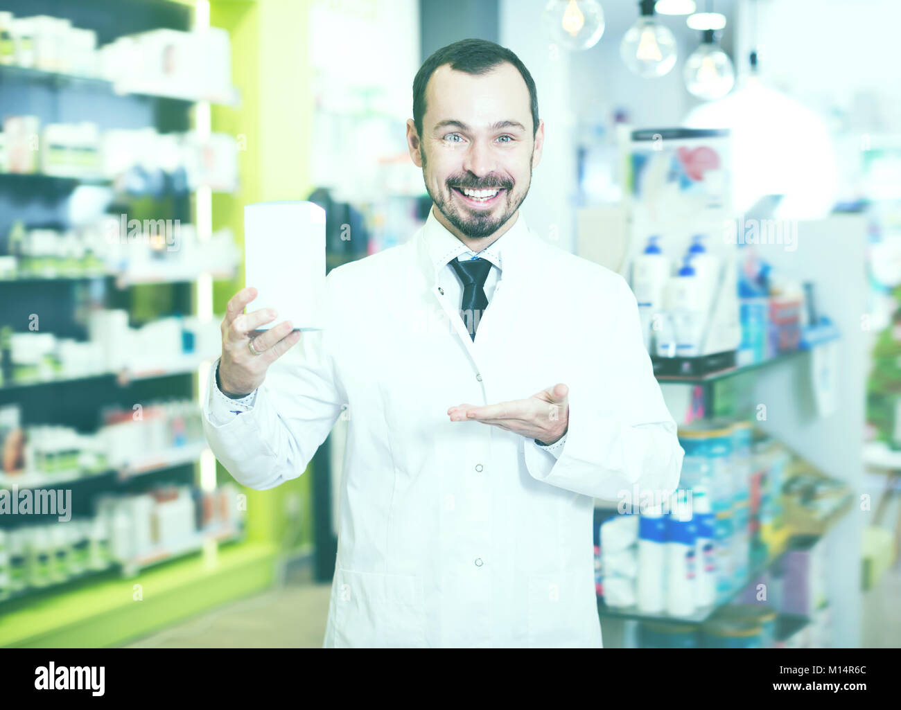 Handsome pharmacist in pharmacy hi-res stock photography and images - Alamy